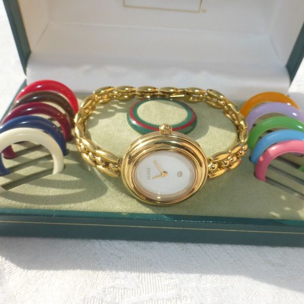 AMAZING Vintage Gucci Woman's Gold watch with interchangeable Bezel ...