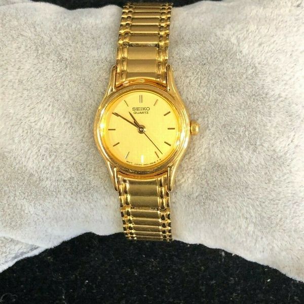 Ladies Seiko Gold Tone Quartz Stretchy Band Watch (1N01-OE19) New Battery | WatchCharts Marketplace