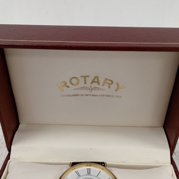 ROTARY QUARTZ Gents Watch Gold Plated Roman Dial Black Strap Boxed ...