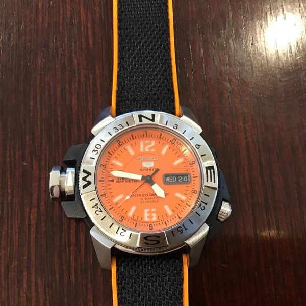 Seiko 5 Map Meter/Mile Marker in Orange | WatchCharts