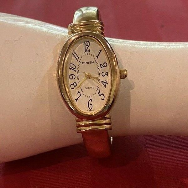 Gruen Ladies Gold Tone Swiss Hinged Cuff Watch 335-902 | WatchCharts ...