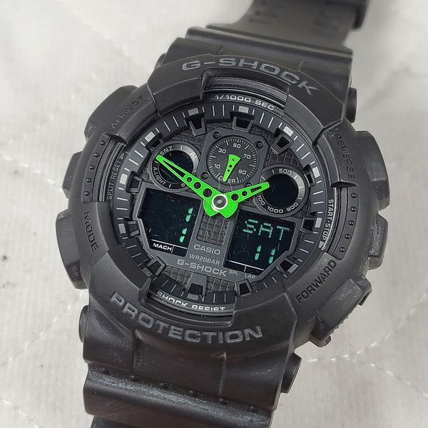 CASIO G-SHOCK GA-100C QUARTZ ANA-DIGI WATCH BLACK & GREEN DIAL NEW BATTERY | WatchCharts Marketplace