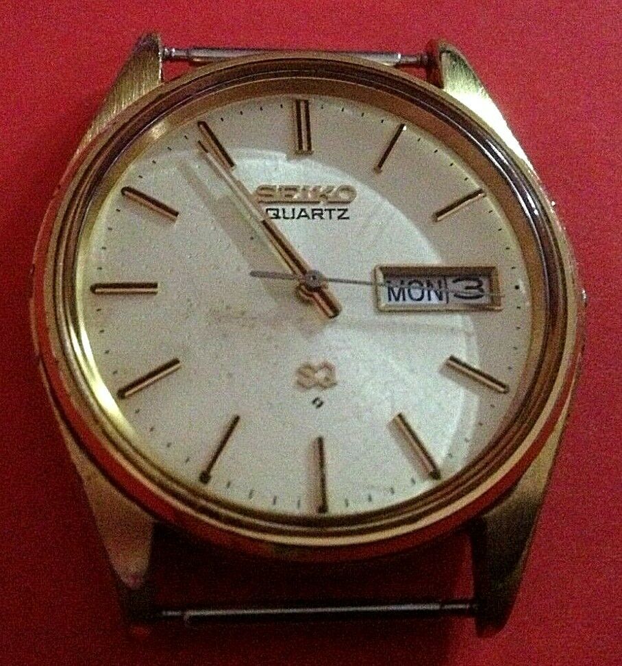 MENS VINTAGE SEIKO QUARTZ GOLD TONE WATCH - 8223-8010 - WITH DAY/DATE - NO STRAP | WatchCharts