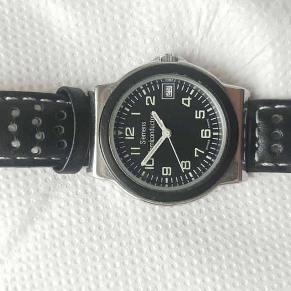 Fortis Logo wristwatch | WatchCharts