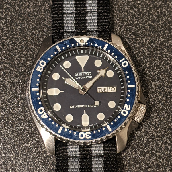 [$150 USD] Seiko SKX009 on Bond Nato runs great nice patina glows like ...