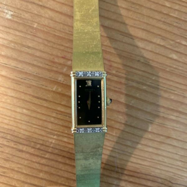 Vintage Ladies SEIKO "2E20-6639" Diamond Quartz Watch with a black face ...
