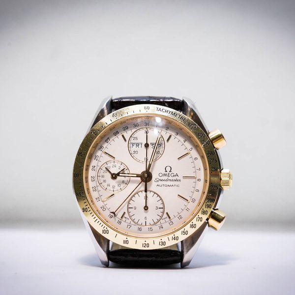 Rare Omega Speedmaster Day Date Month *18K gold bezel* | WatchCharts