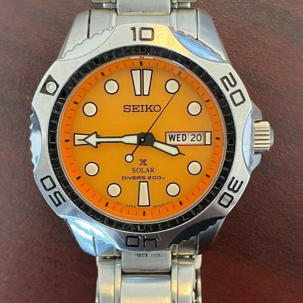 Seiko SNE-109 Solar ORANGE FACE | WatchCharts Marketplace