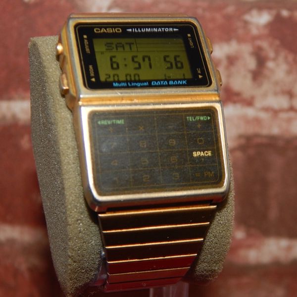 Casio Databank DBC-611G 3238 Digital Unisex Gold Watch | WatchCharts ...