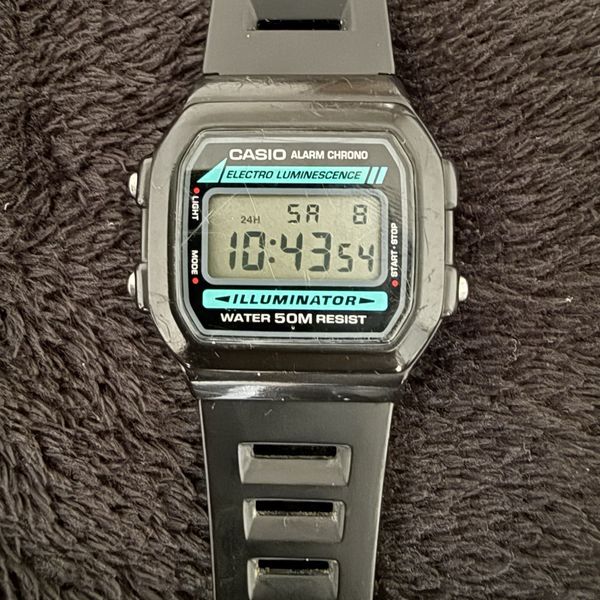 Casio W-86 digital watch with a black resin case and bracelet. READ ...