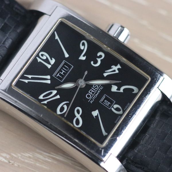 Oris Rectangular Day Date 30 Stainless Steel 585 7525 4064 Price as of January 2026 | WatchCharts