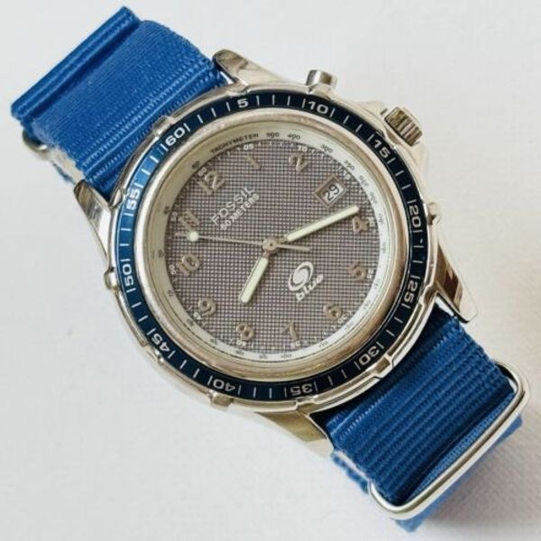 Vintage Fossil StarMaster Mens Perforated Dial Date Watch Blue Bezel LU ...