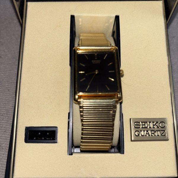 Vintage Seiko Quartz Watch Mens Gold Tone Tank Black Dial/ Japanese Movement | WatchCharts ...