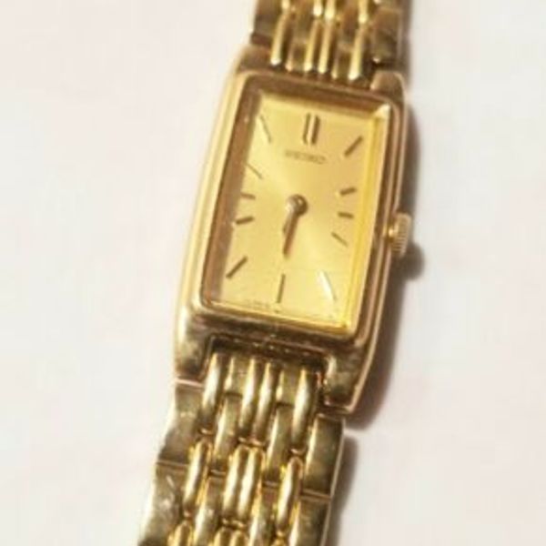 Seiko 2E20-7023 Women's Watch Gold Tone Slim Rectangular Runs New Battery | WatchCharts Marketplace