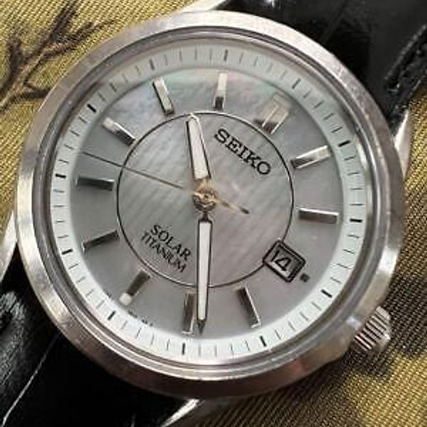 Seiko Titanium Shell Dial v145-0AZ0 Solar Men's | WatchCharts