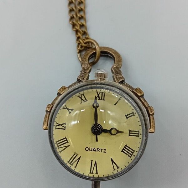 QUARTZ BALL GLASS POCKET WATCH on 17" chains with glass magnifier ...