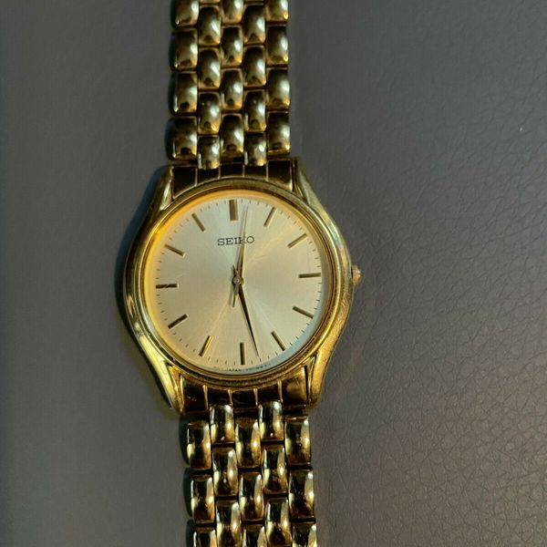 Vintage SEIKO V701-7A18 Men's Watch Analog Quartz Gold tone | WatchCharts Marketplace