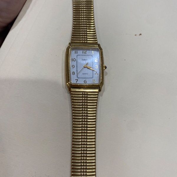 Vintage Timex BA Cell Gold Tone Classic Quartz menâ s Wrist Watch ...