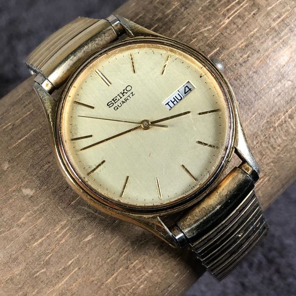Seiko Men 6533-8019 Day Date Gold Tone Expansion 33mm Quartz Analog ...