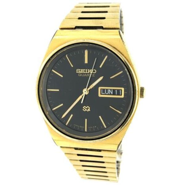 Vintage Seiko SQ Quartz Day/Date Gold Tone Black Dial Watch 8223-7119 | WatchCharts Marketplace