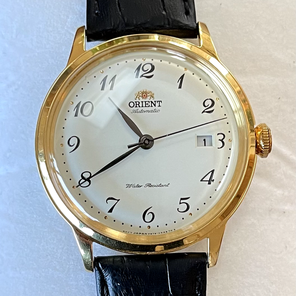 Orient Bambino 5th-Gen Automatic Dress Watch with White Dial, Arabic Numerals | WatchCharts ...