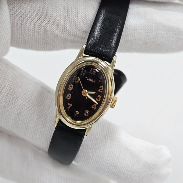 VINTAGE TIMEX ELEGANT OVAL DIAL QUARTZ WOMEN'S GOLDEN BLACK LEATHER ...
