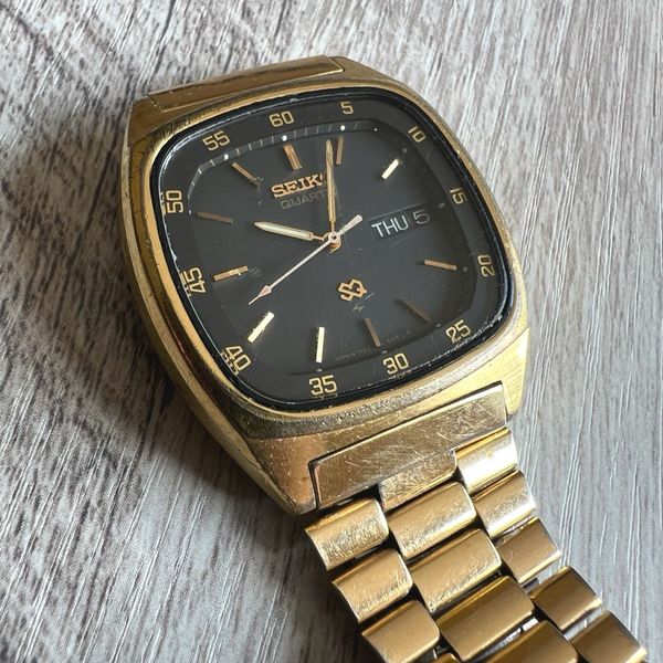 Vintage Seiko SQ Gold Tone Black Dial Day Date TV Dial | WatchCharts Marketplace