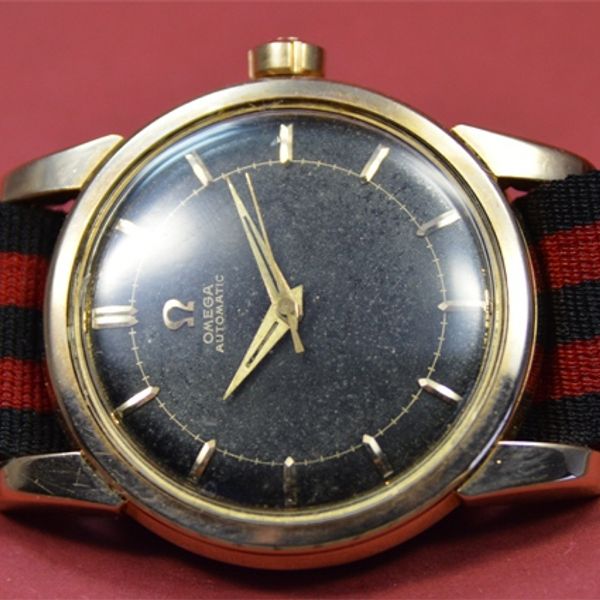 Omega cal 501, black dial US$700 | WatchCharts Marketplace