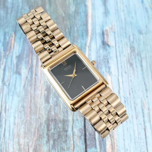 Vintage Seiko Ultra Thin Rectangle Case Gold Tone Quartz. 9021-5000 | WatchCharts Marketplace