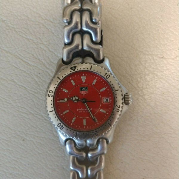 Tag Heuer SEL Mid Sized Rare Red Face | WatchCharts