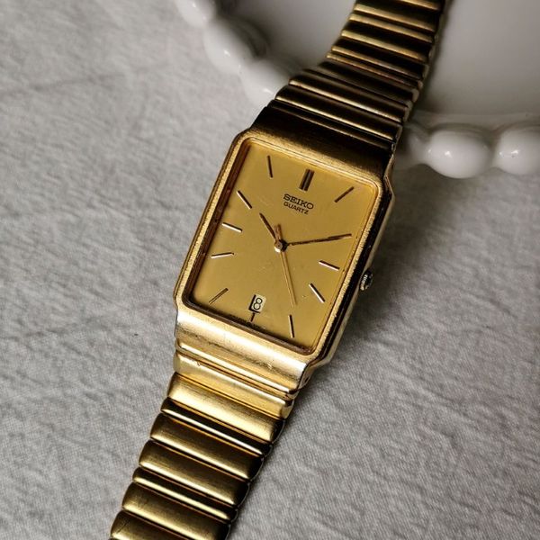 Vintage Seiko Men Tank Rectangular Gold Tone Date luxury watch | WatchCharts Marketplace