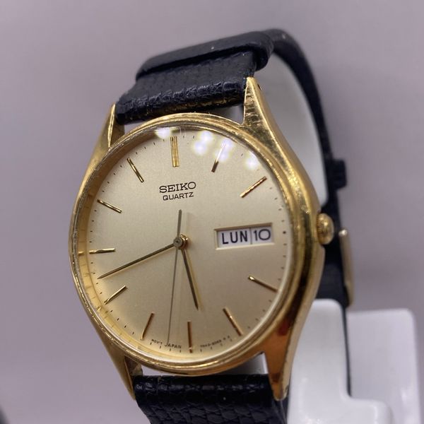 Seiko Mens Quartz Gold Tone Watch Black Leather Band New Battery | WatchCharts Marketplace