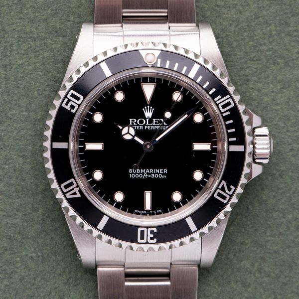 1997 Tritium Rolex 14060 Submariner | WatchCharts Marketplace