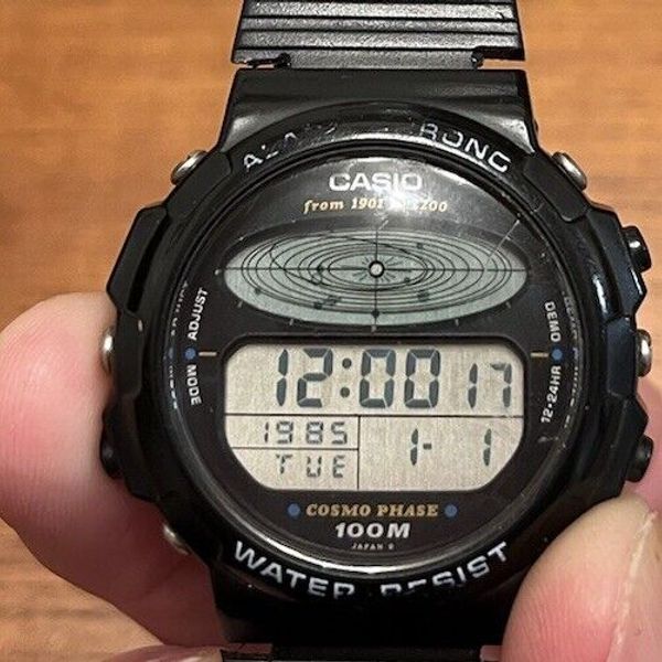 Casio CGW-50 Cosmo Phase 100m Digital Planetarium Watch *READ ...