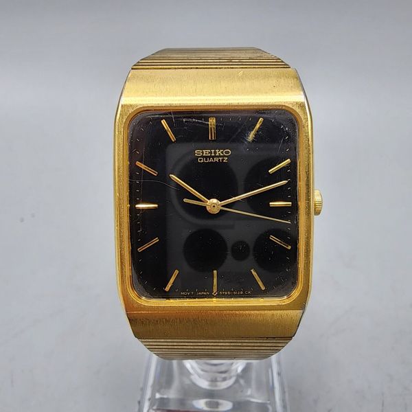 VTG Seiko Tank Watch Men 26mm Black Dial Gold Tone Rectangle 5Y95-5000 New Batt | WatchCharts ...