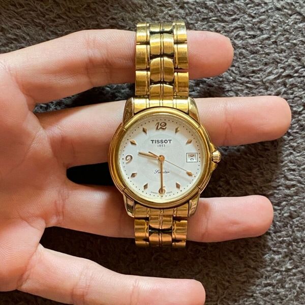 TISSOT gold-plated men's watch | WatchCharts