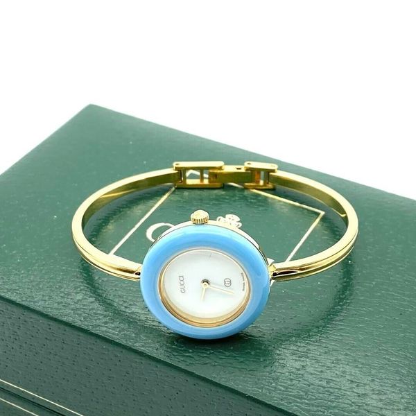 Gucci Change Bezel 11 Colors White / Gold Dial Women Watch in Box ...
