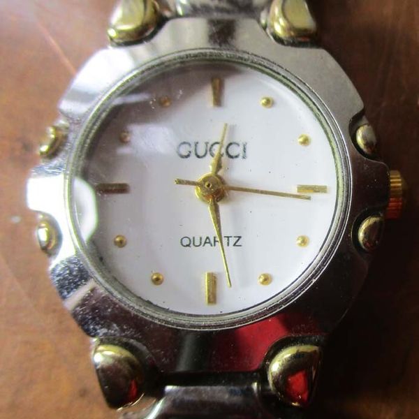 GUCCI WOMAN'S WATCH SILVER AND GOLD TONED CHINA WRISTBAND | WatchCharts ...