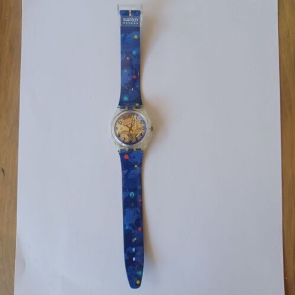 Vintage Swatch Watch Clear Face And Back, Blue Bezel, Blue Solar System ...