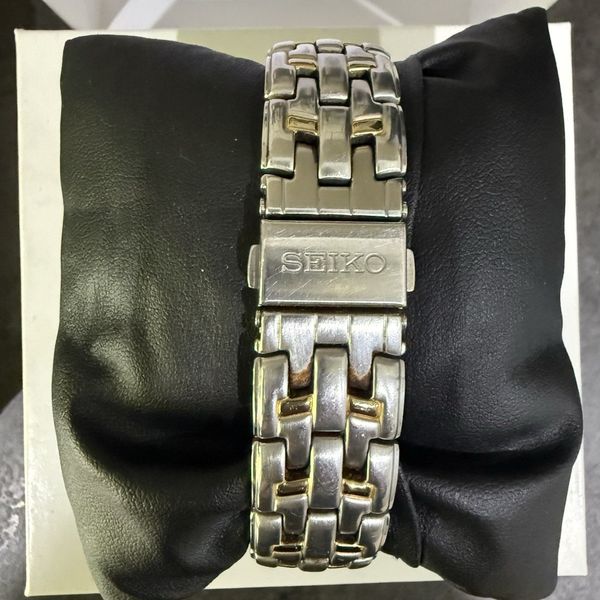 Seiko Menâ s Date And Time Black Faced Watch With Silver And Gold Strap ...