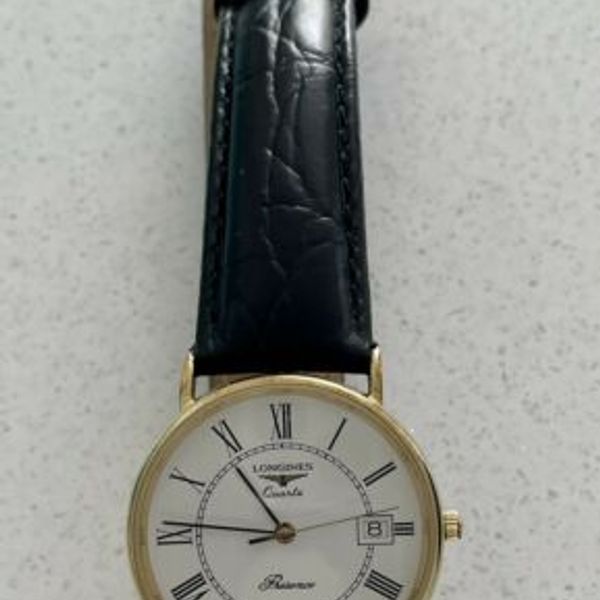 A Working 9 Ct Longines Quartz Presence Mans Wristwatch With Date ...