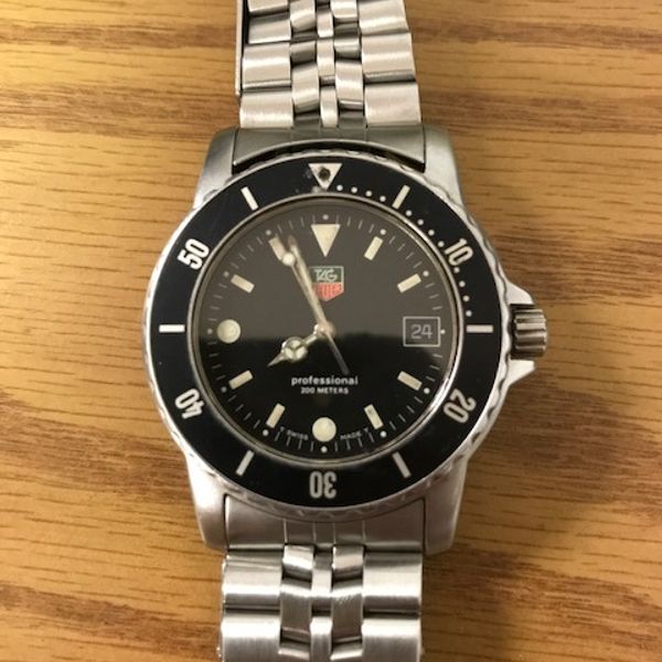 Tag Heuer 1500 929.206 Full Size Black Face Black Bezel | WatchCharts