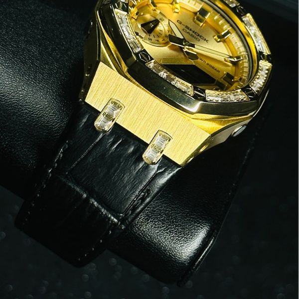 CasiOak GA-2100 in gold bezel with Baguette crystals , leather strap ...