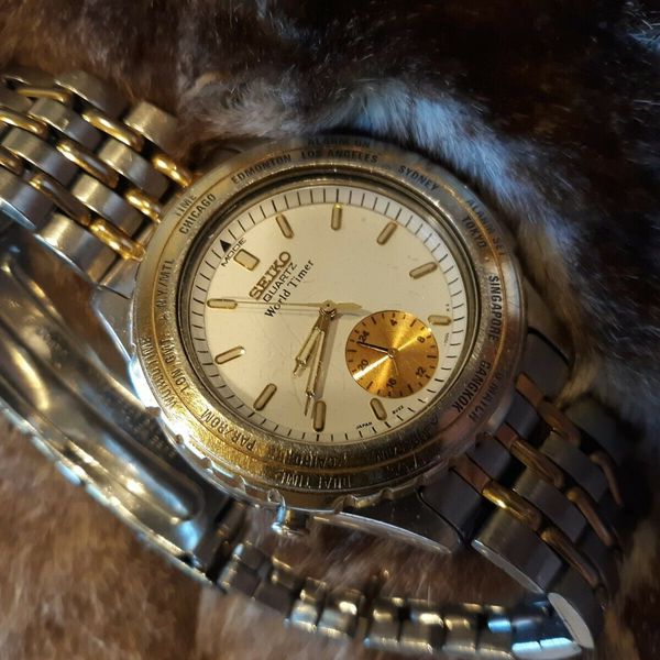 Seiko Quartz World Timer watch gold / stainless 8v22-7000 | WatchCharts ...