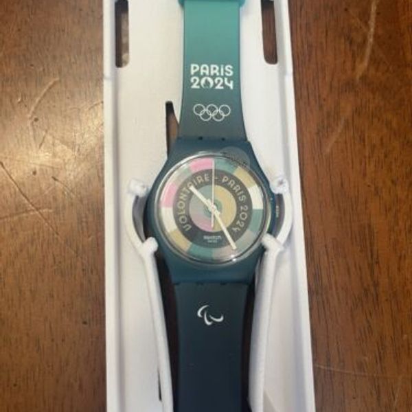 Paris 2024 Olympics Swatch Watch For Volunteers | WatchCharts Marketplace