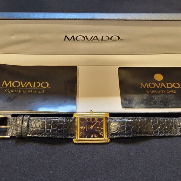 Movado Men's Gold Watch with rectangular black face and original ...