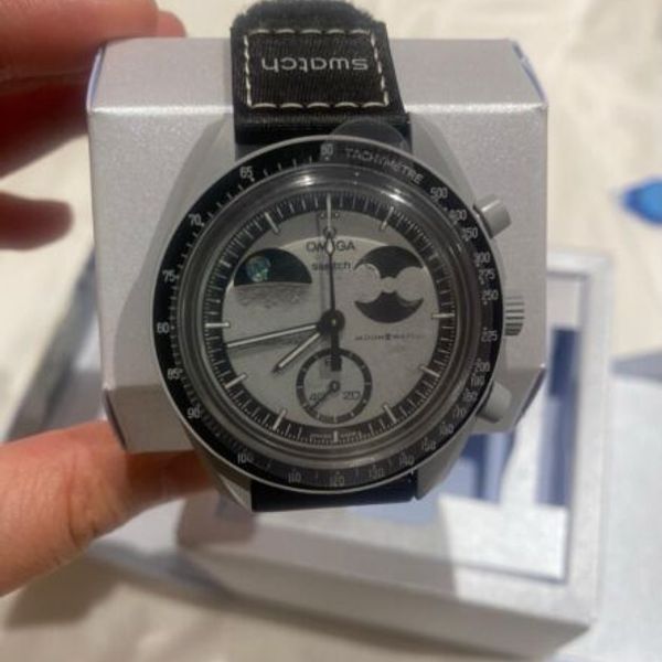 Swatch x Omega Mission to the EarthPhase - MoonSwatch | | WatchCharts ...