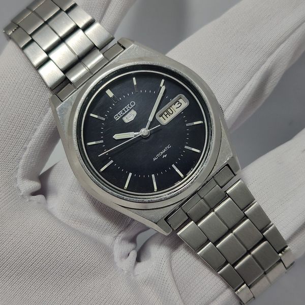 Vintage Seiko 5 Automatic Day/Date ( Black Dial ) Japan Men's Watch 7009-8760 | WatchCharts ...