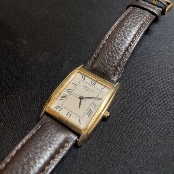 Gold Rotary tank watch mens | WatchCharts Marketplace