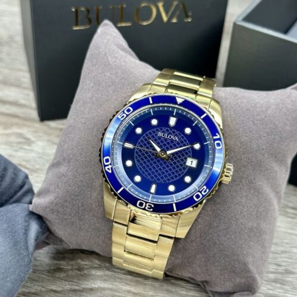 NEWâ Bulova Classic Sport Blue Dial Rotating Bezel Gold Tone Men's ...